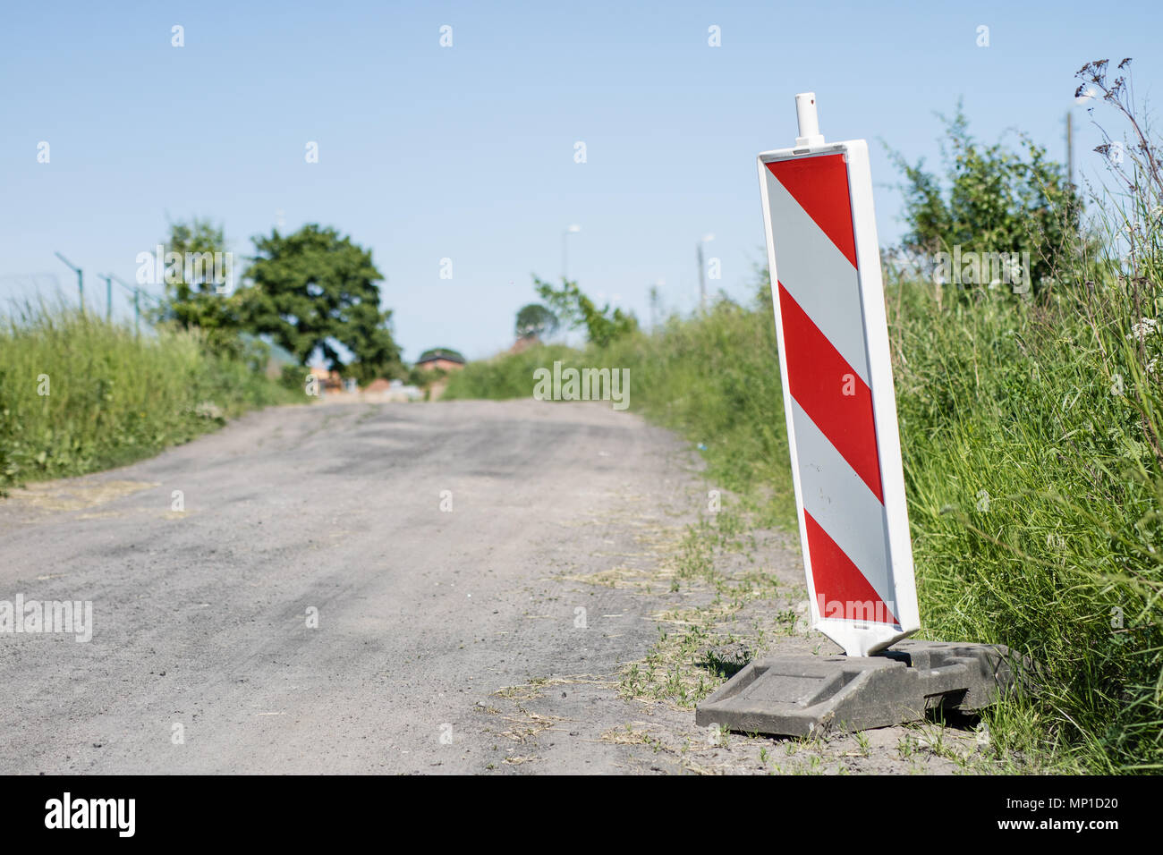 Construction site for a new road for cars. Laying paving blocks, new ...