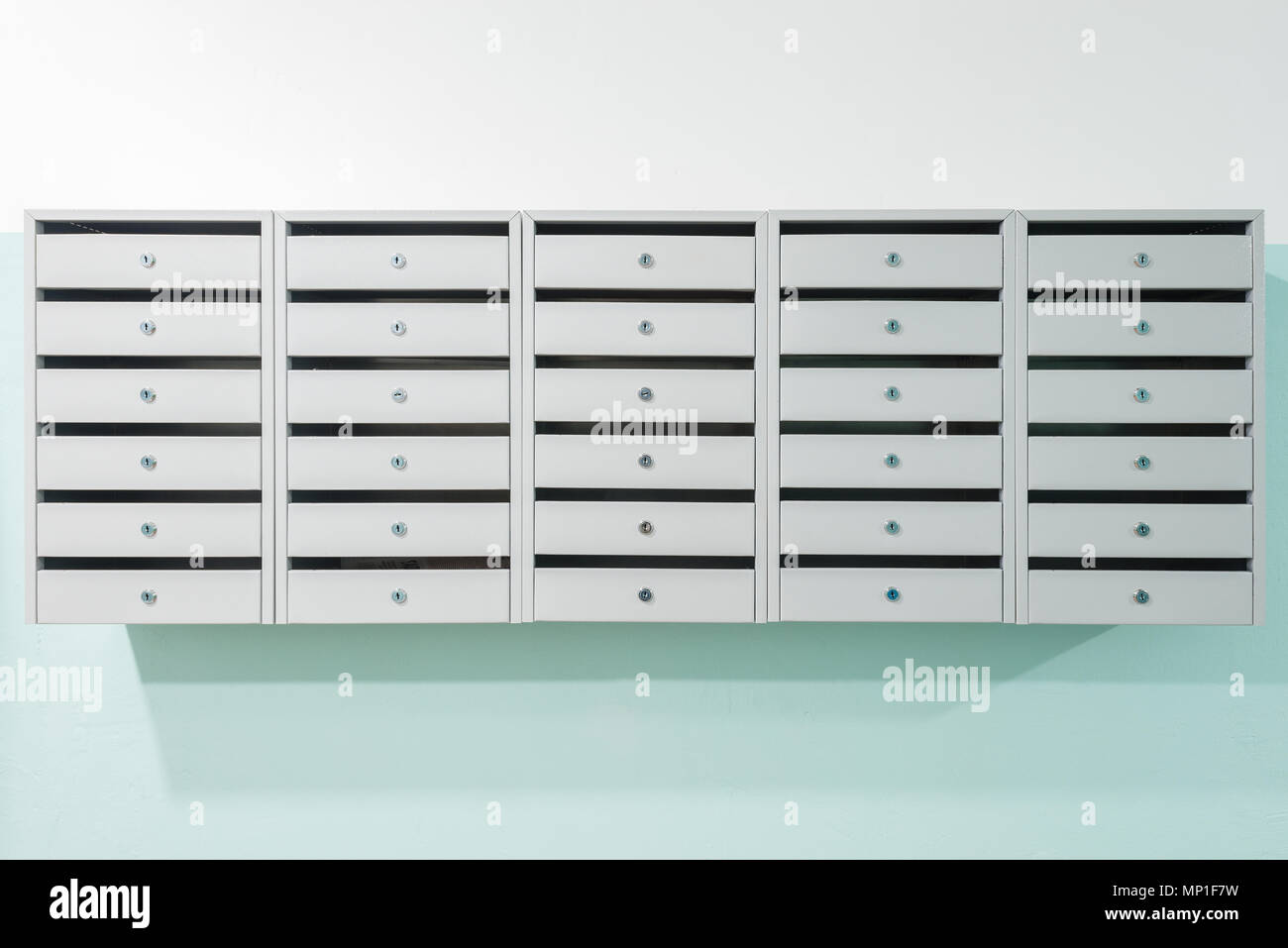 Post boxes inside of the apartment house Stock Photo - Alamy