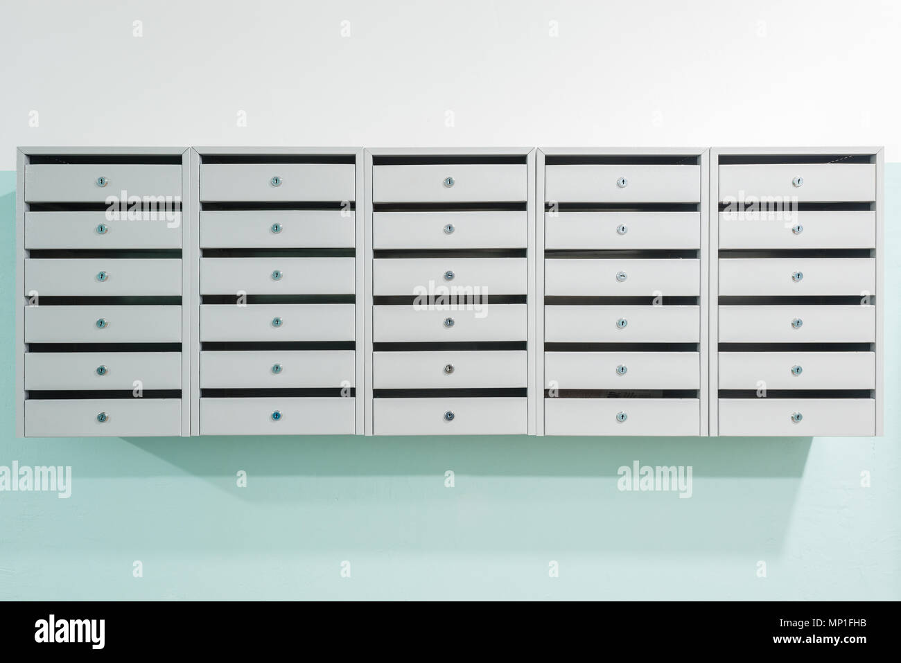 Post boxes inside of the apartment house Stock Photo - Alamy