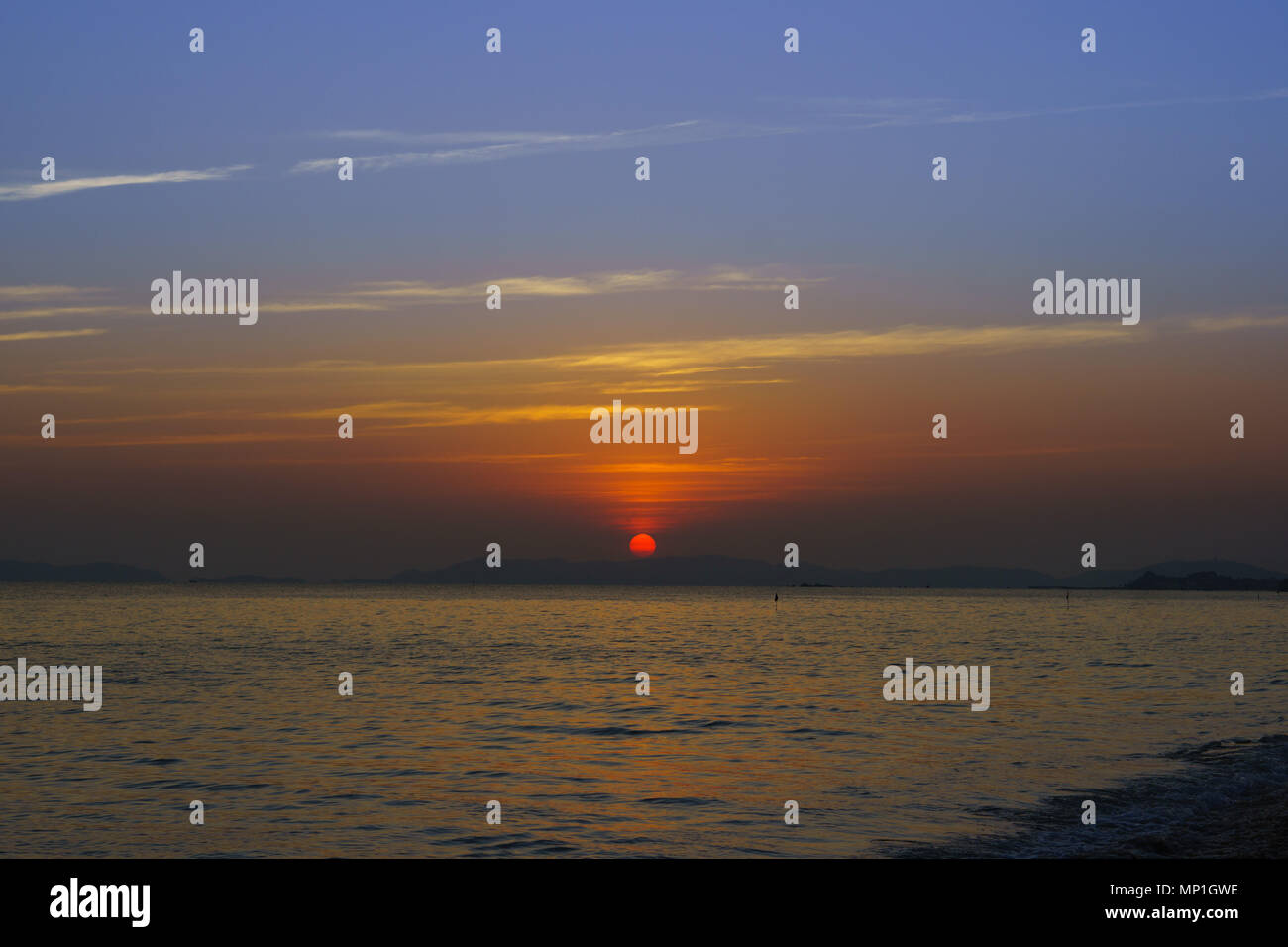 Warm beach sunset hi-res stock photography and images - Alamy
