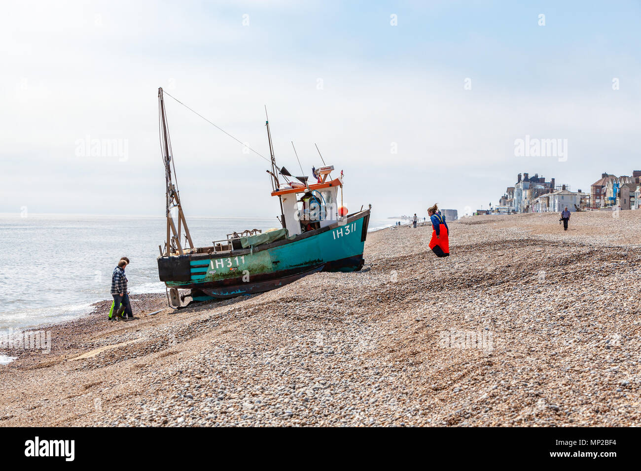 fishing trawler crew landing boat on suffolk coast Stock Photo - Alamy