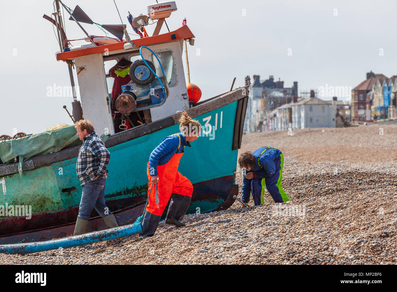 fishing trawler crew landing boat on suffolk coast Stock Photo - Alamy