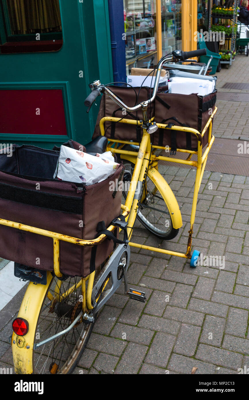 Irish Post Office, An Post, Postman with letter and parcel carrying ...