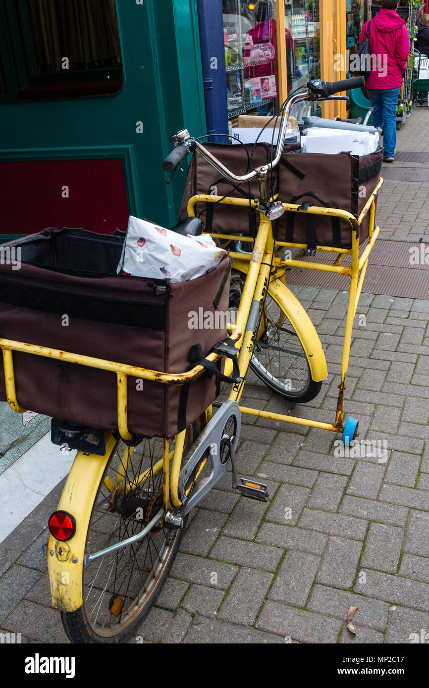 Irish Post Office, An Post, Postman with letter and parcel carrying ...