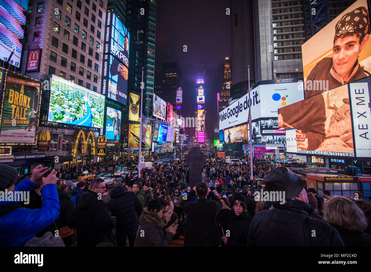 New York, US - March 30, 2018: View of people visiting the famous Times ...