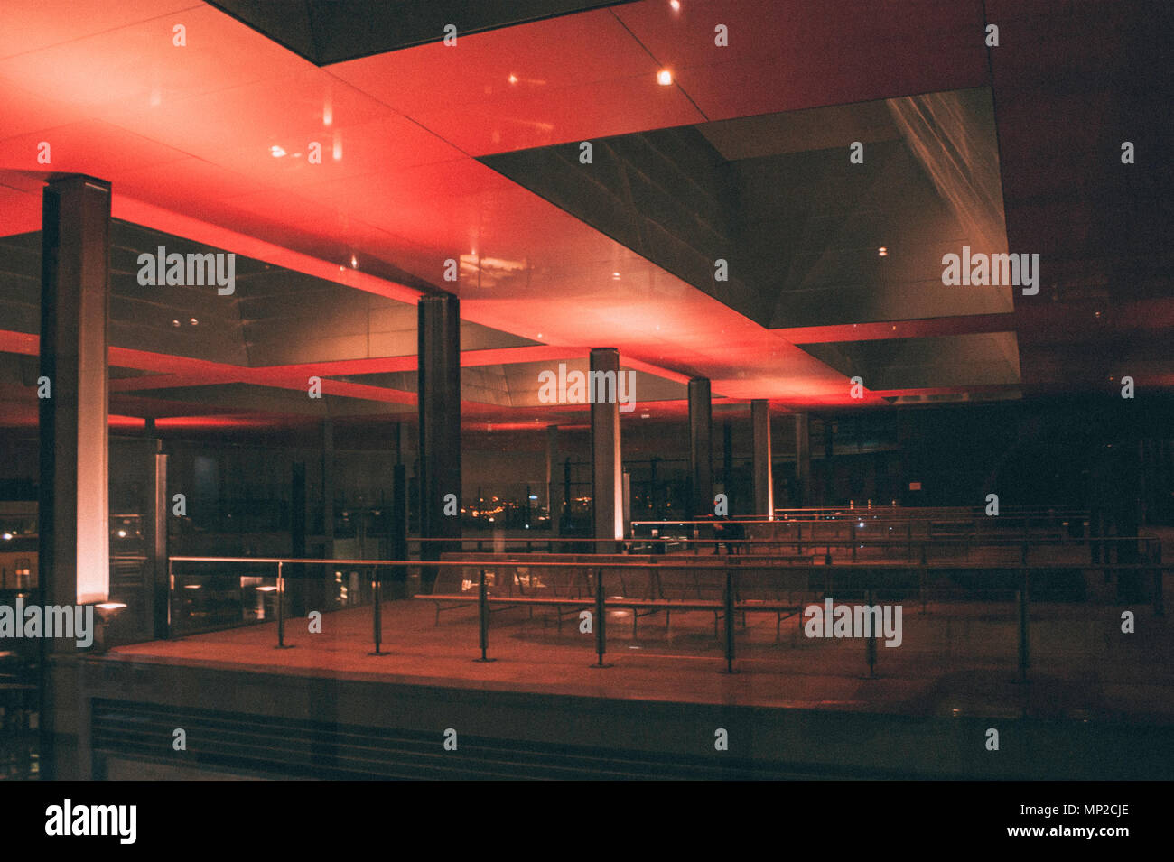 Modern architecture interior with red lights Stock Photo - Alamy