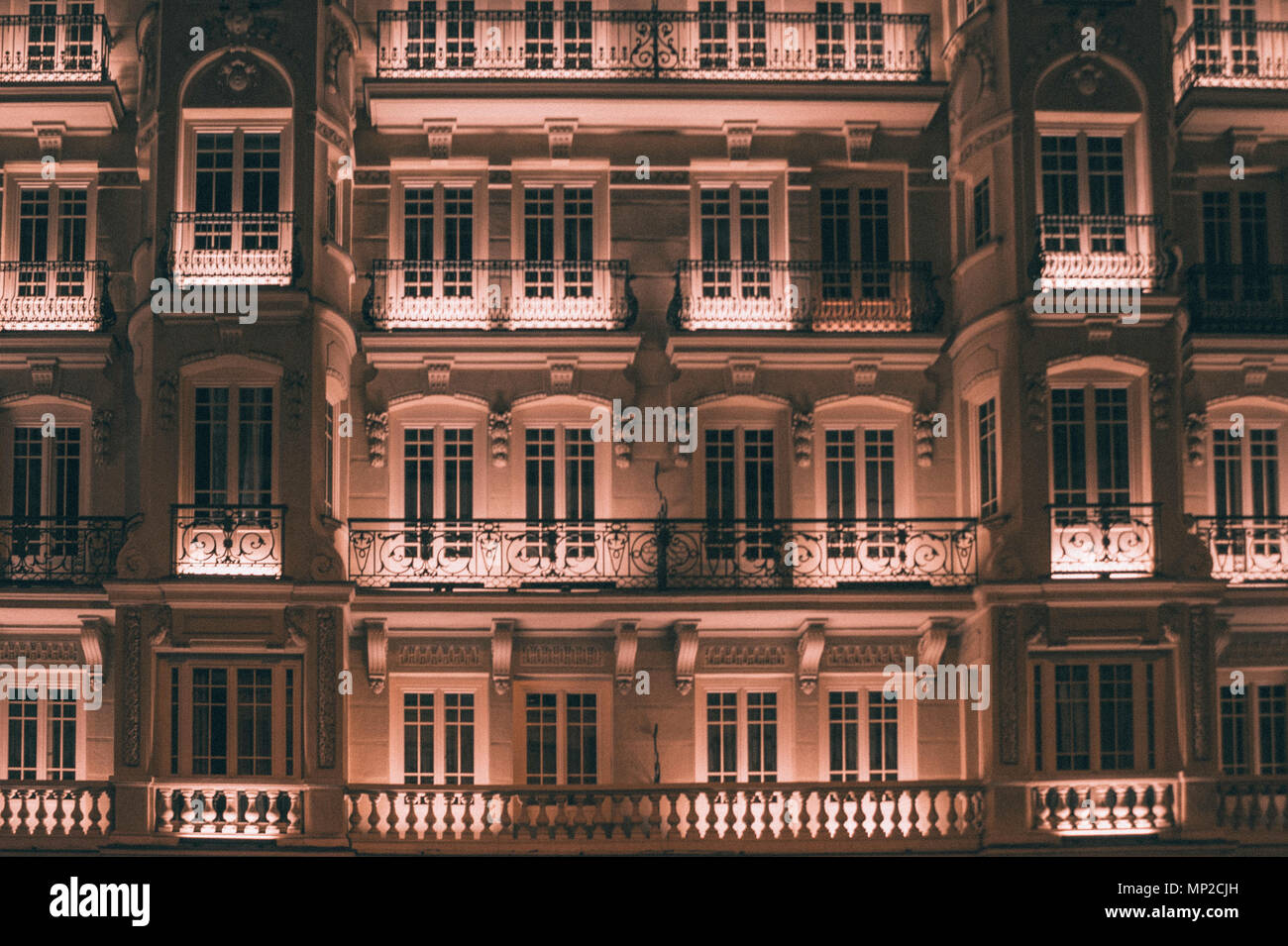 Building architecture, regular windows with lights in the night Stock ...