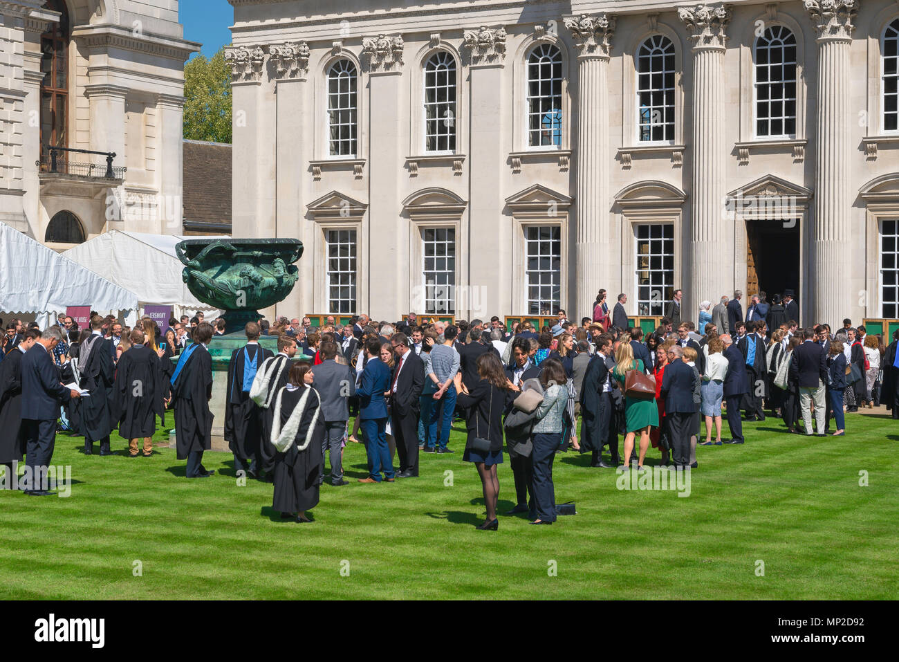 Graduation ceremony, family and friends of newly graduated Cambridge ...