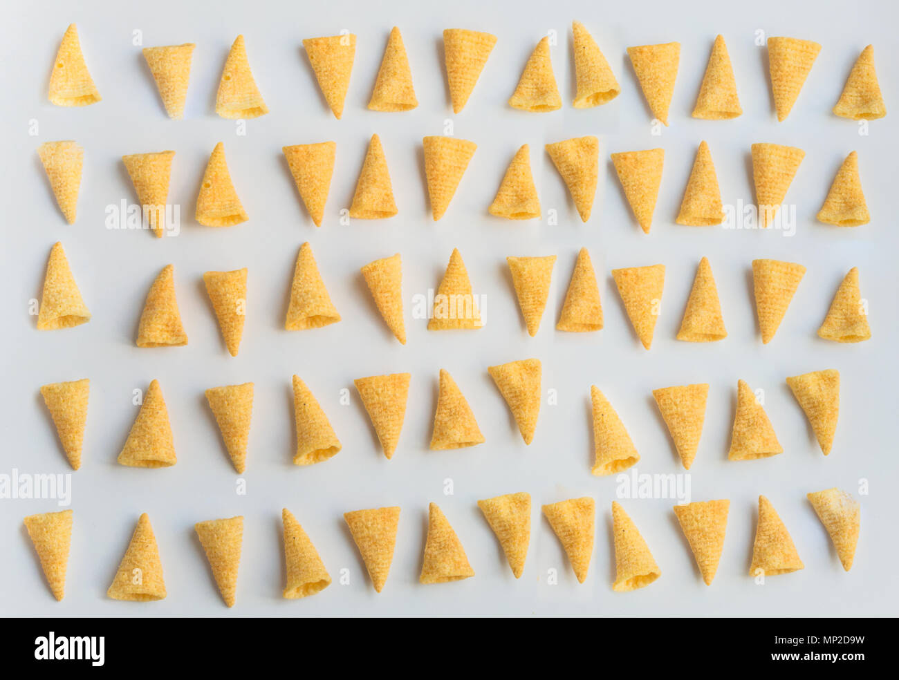 Corn cones pattern on white background Stock Photo - Alamy