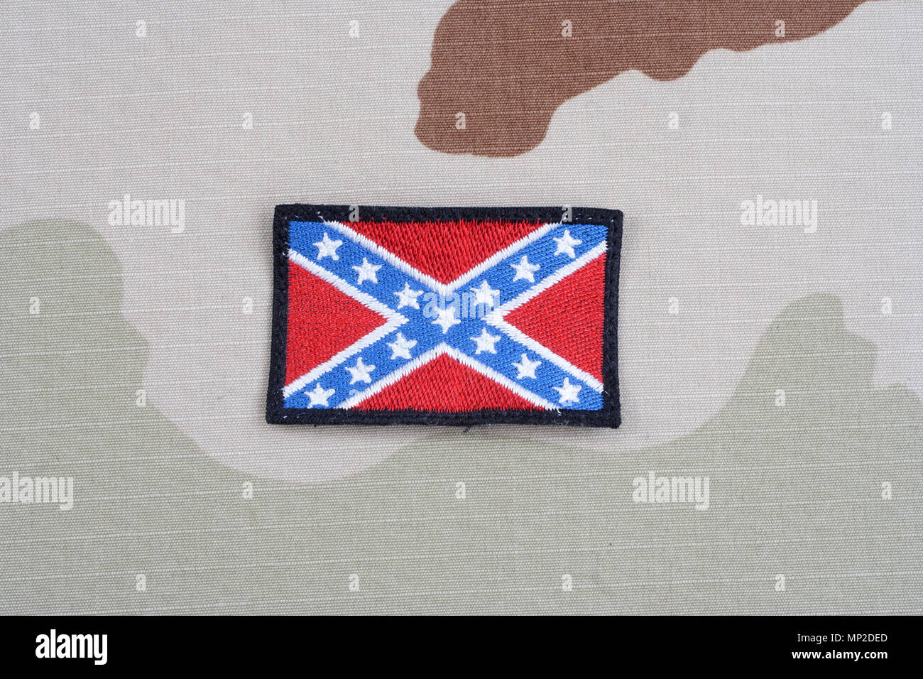 KIEV, UKRAINE - May 18, 2015. Confederate flag on camouflage uniform ...