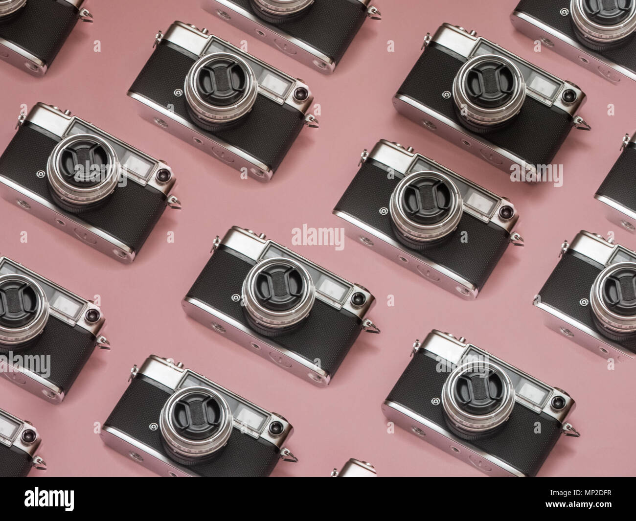 Pink vintage camera pattern Stock Photo - Alamy