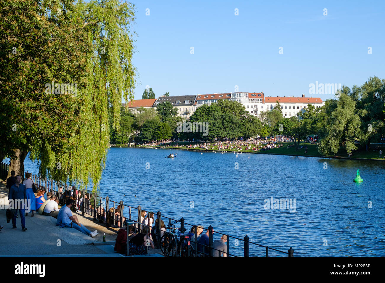 Berlin, Germany - may, 20: People enjoying summer day at riverside in ...