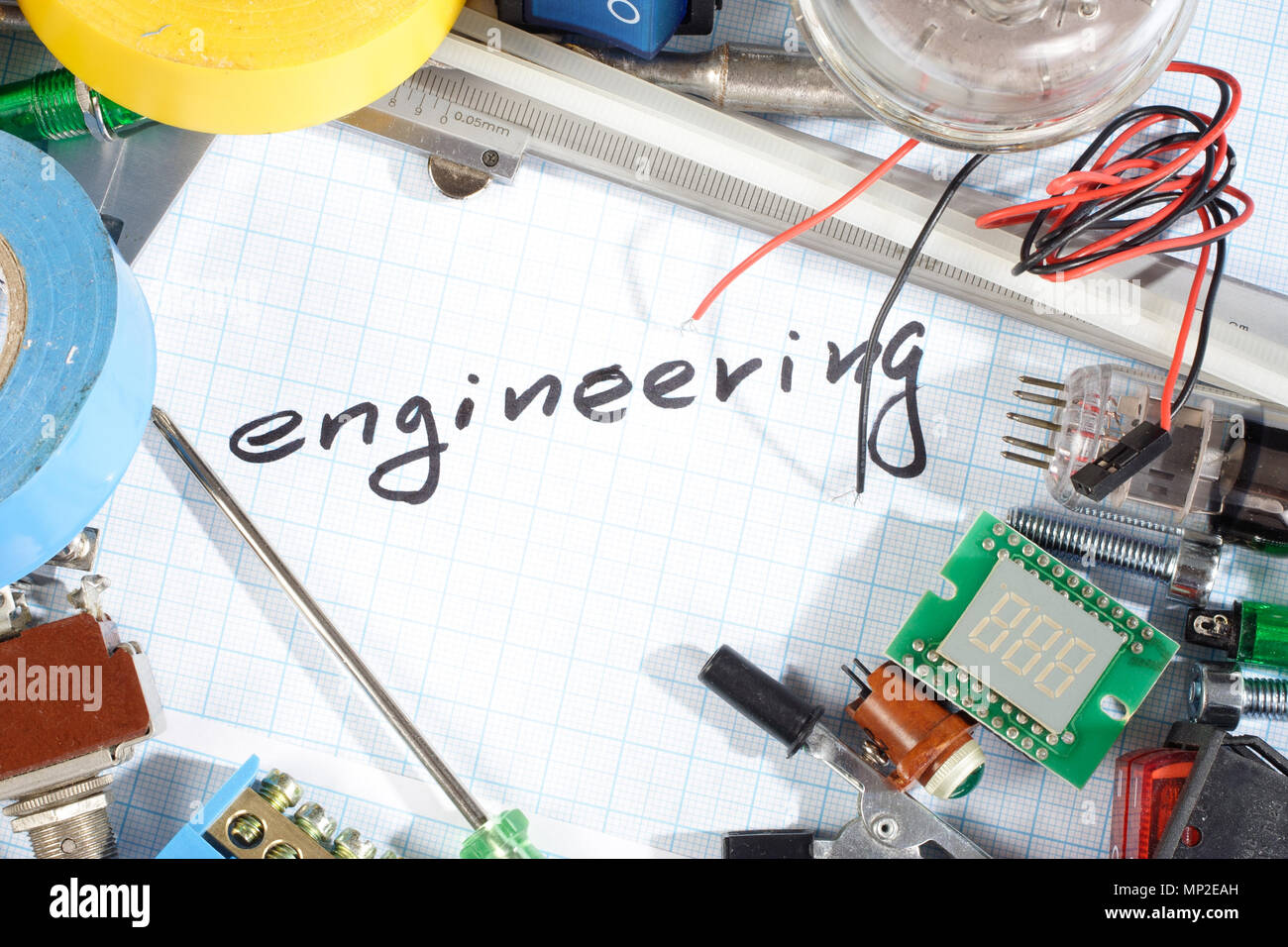 "engineering" - radio-electronic parts on graph paper background Stock ...