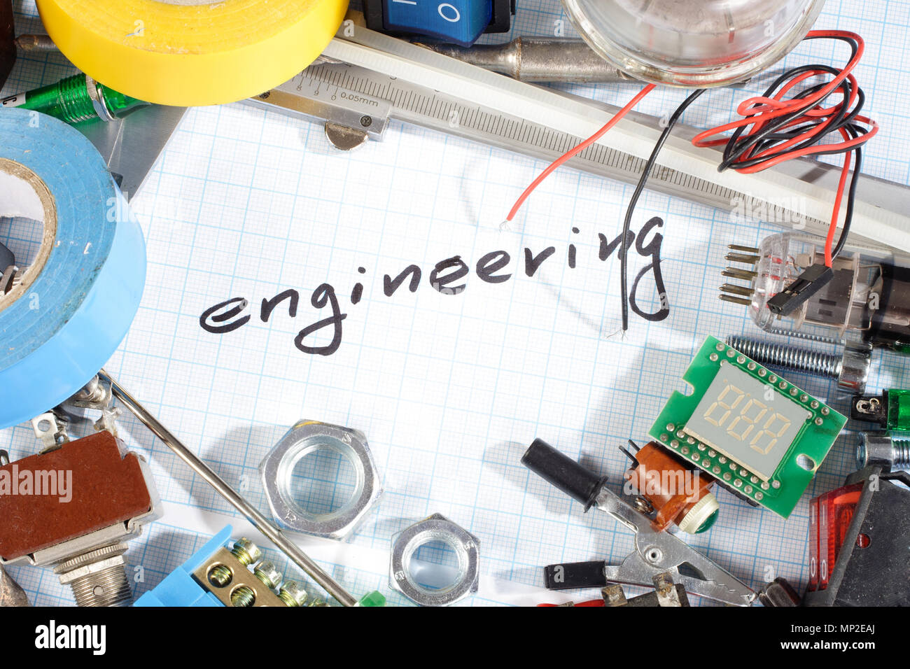 "engineering" - radio-electronic parts on graph paper background Stock ...