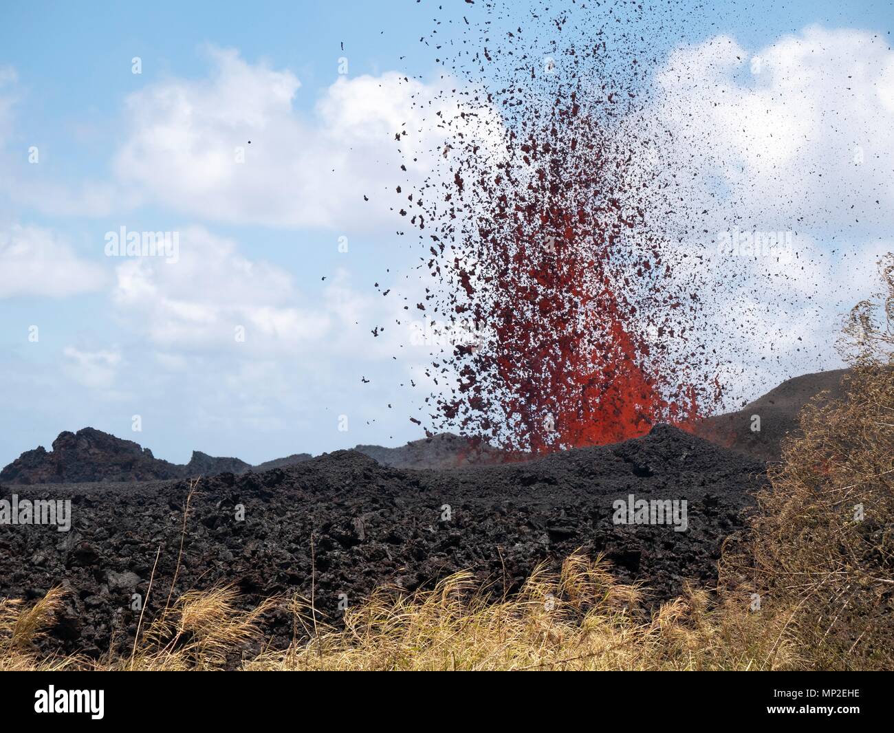 Lava spews out from fissure 17 caused by the eruption of the Kilauea ...