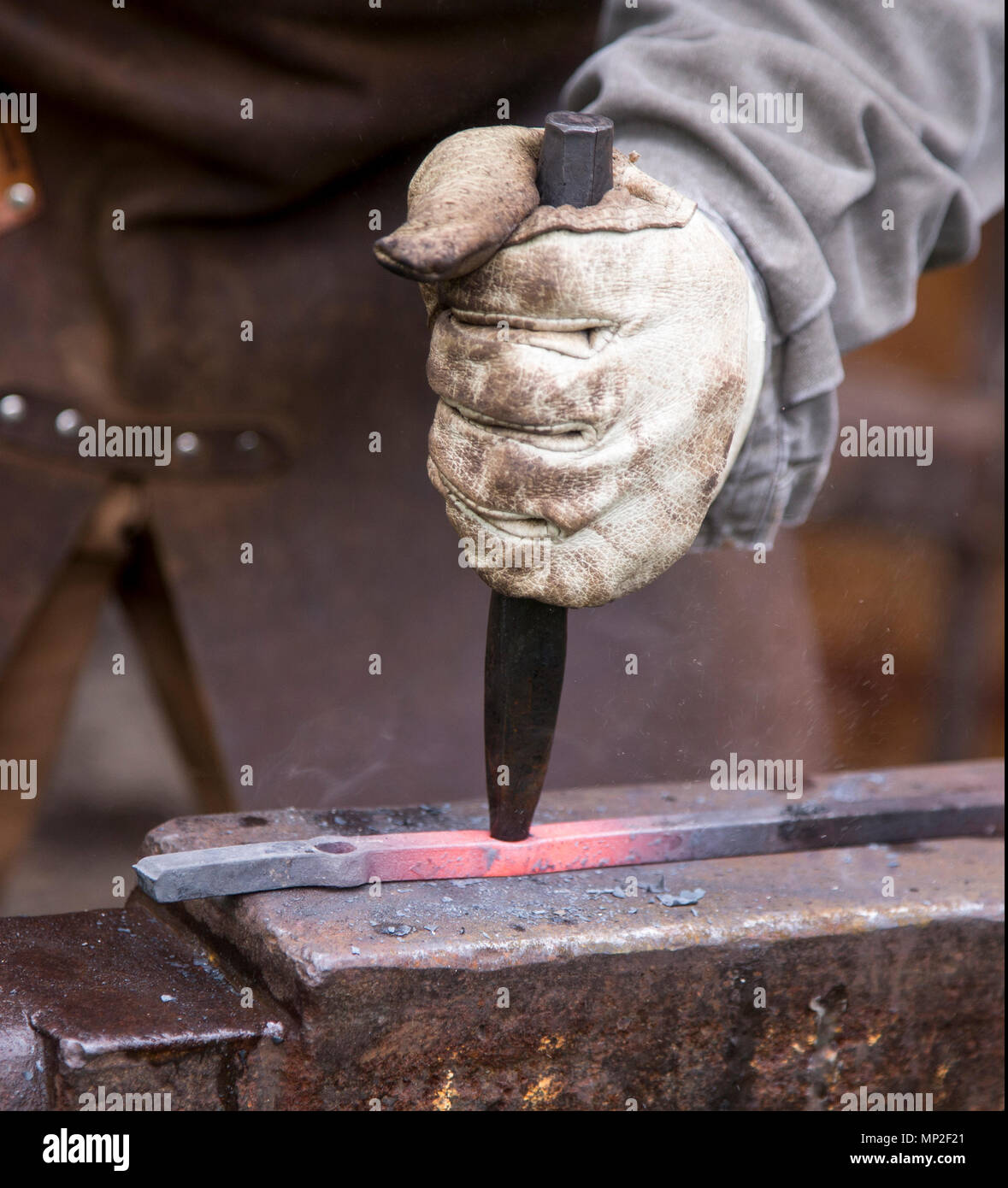 A blacksmith working at the Hopper-Goetschius House and museum in Upper ...