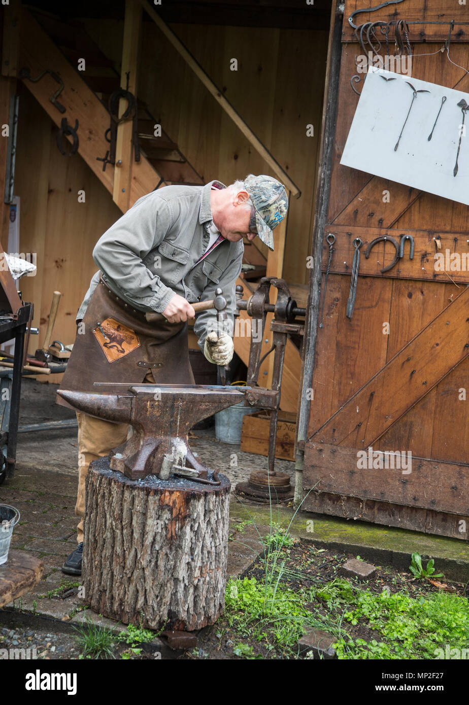 A blacksmith working at the Hopper-Goetschius House and museum in Upper ...