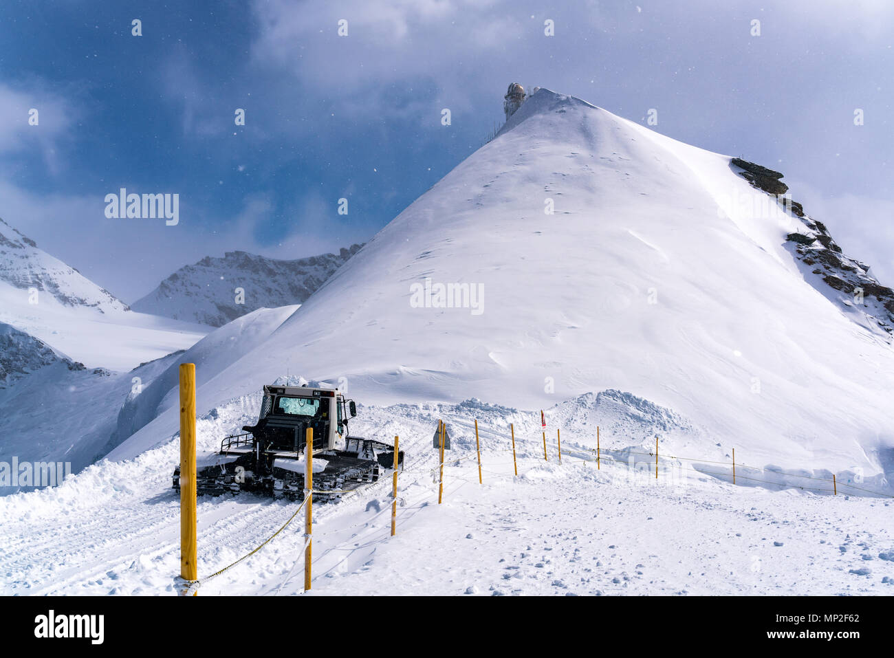 View of snow covered Sphinx Observatory at the Jungfraujoch during ...
