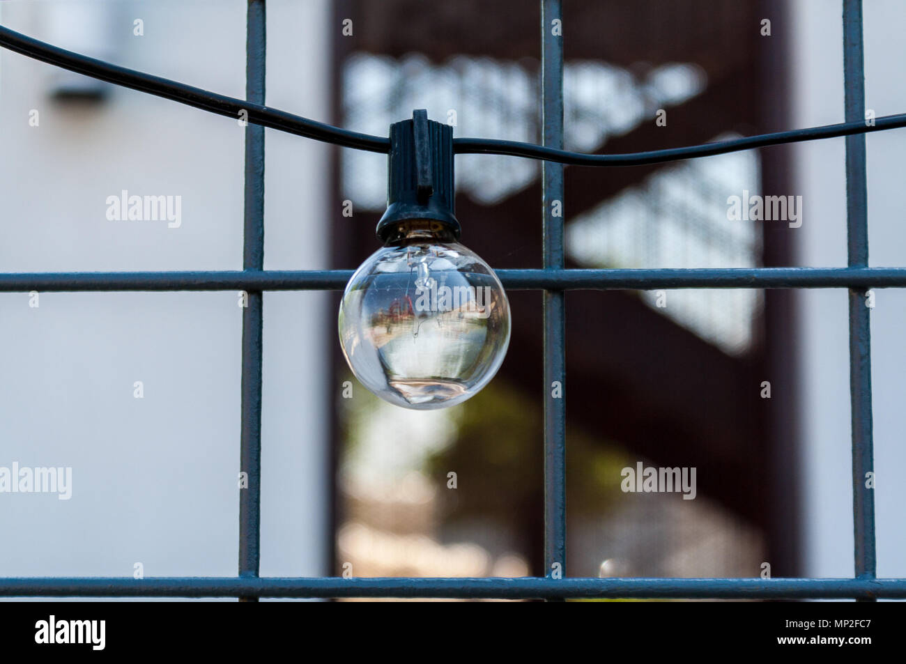 Light bullb inverted reality Stock Photo - Alamy