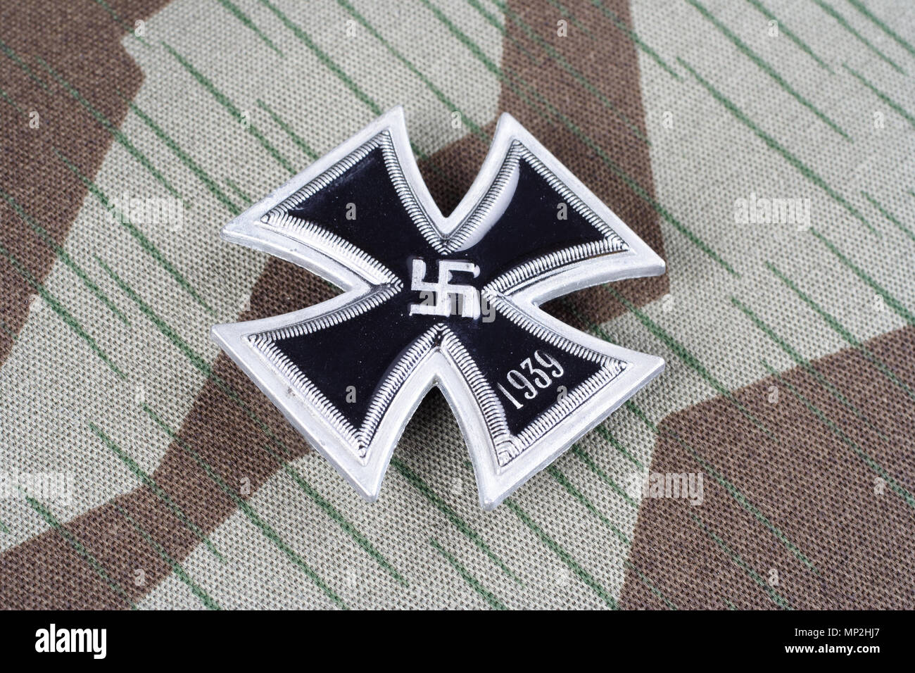 nazi german award Iron Cross on camouflage uniform Stock Photo - Alamy