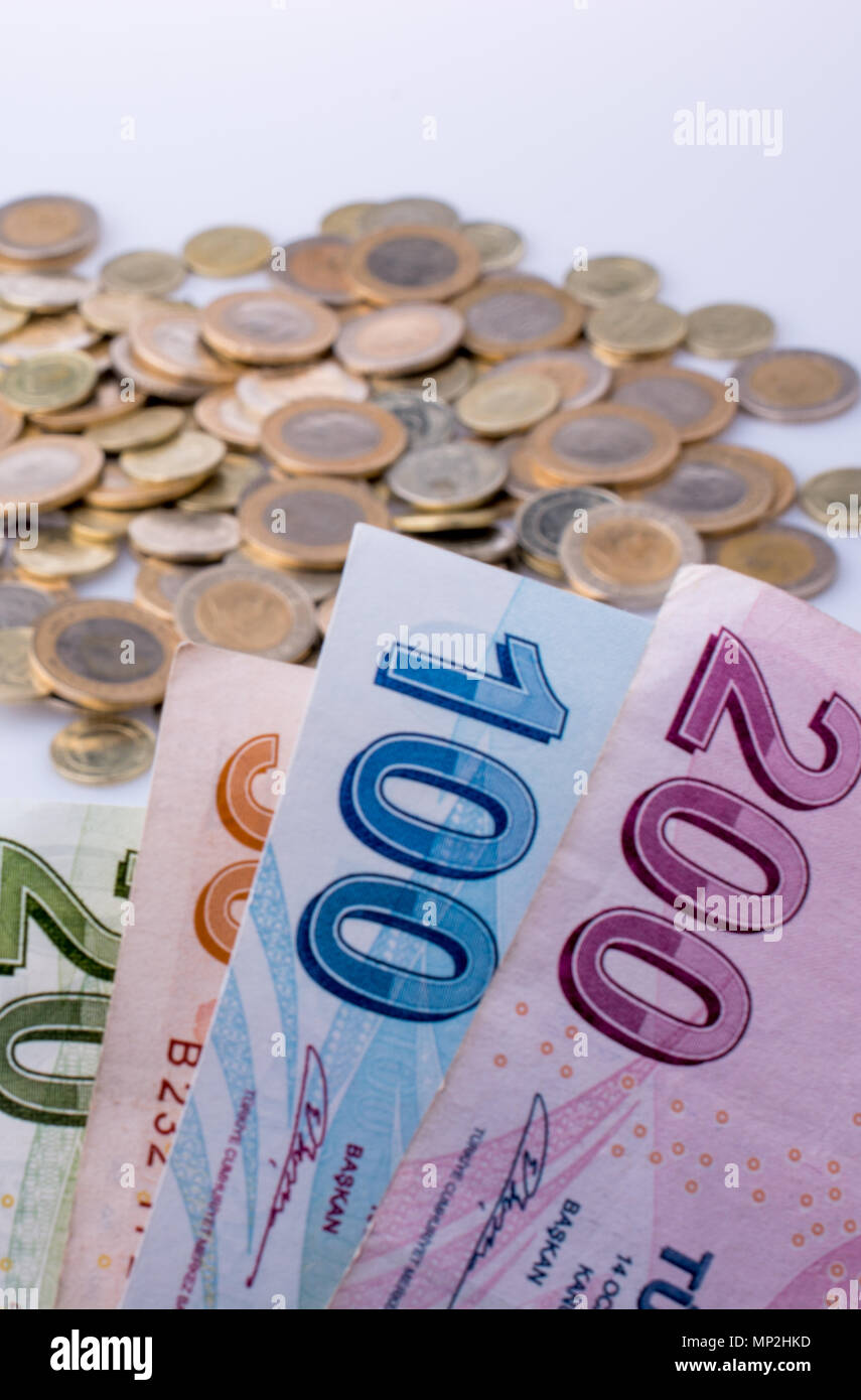 Turkish Lira coins and banknotes side by side on white background Stock ...