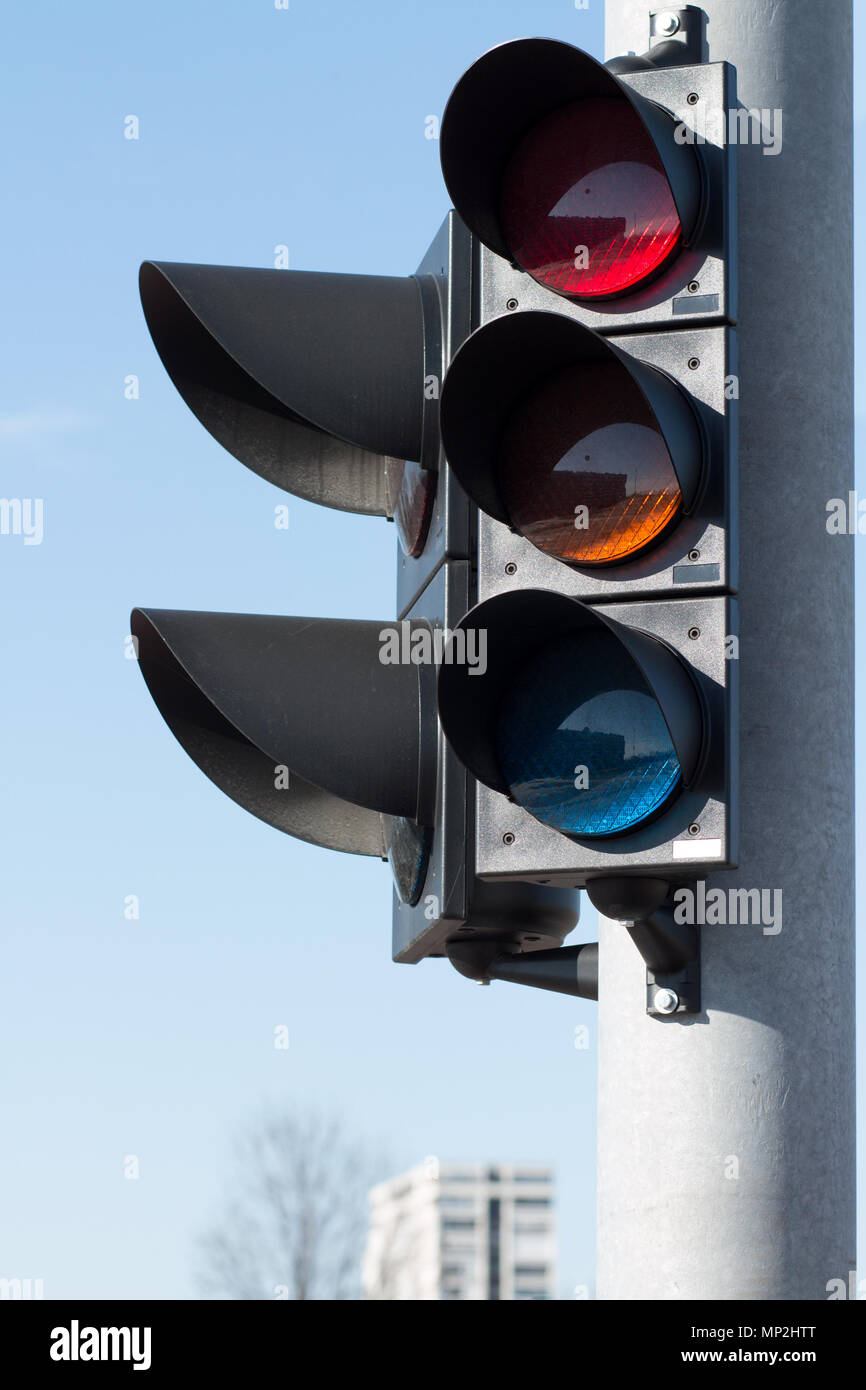 Modern traffic light on a sunny day with blue sky as background Stock ...