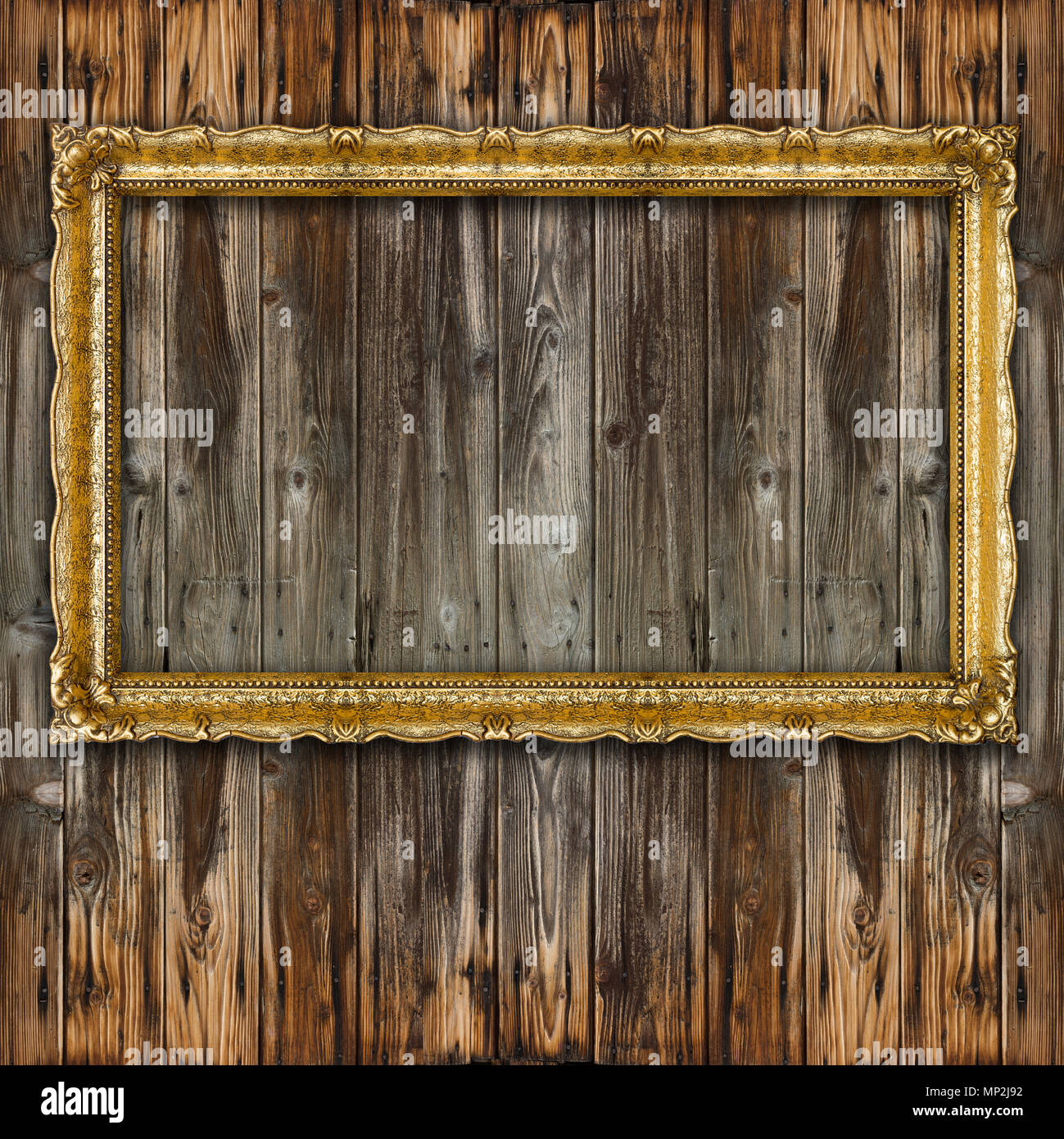 Retro Big Old Picture Frame on wooden baclground Stock Photo - Alamy