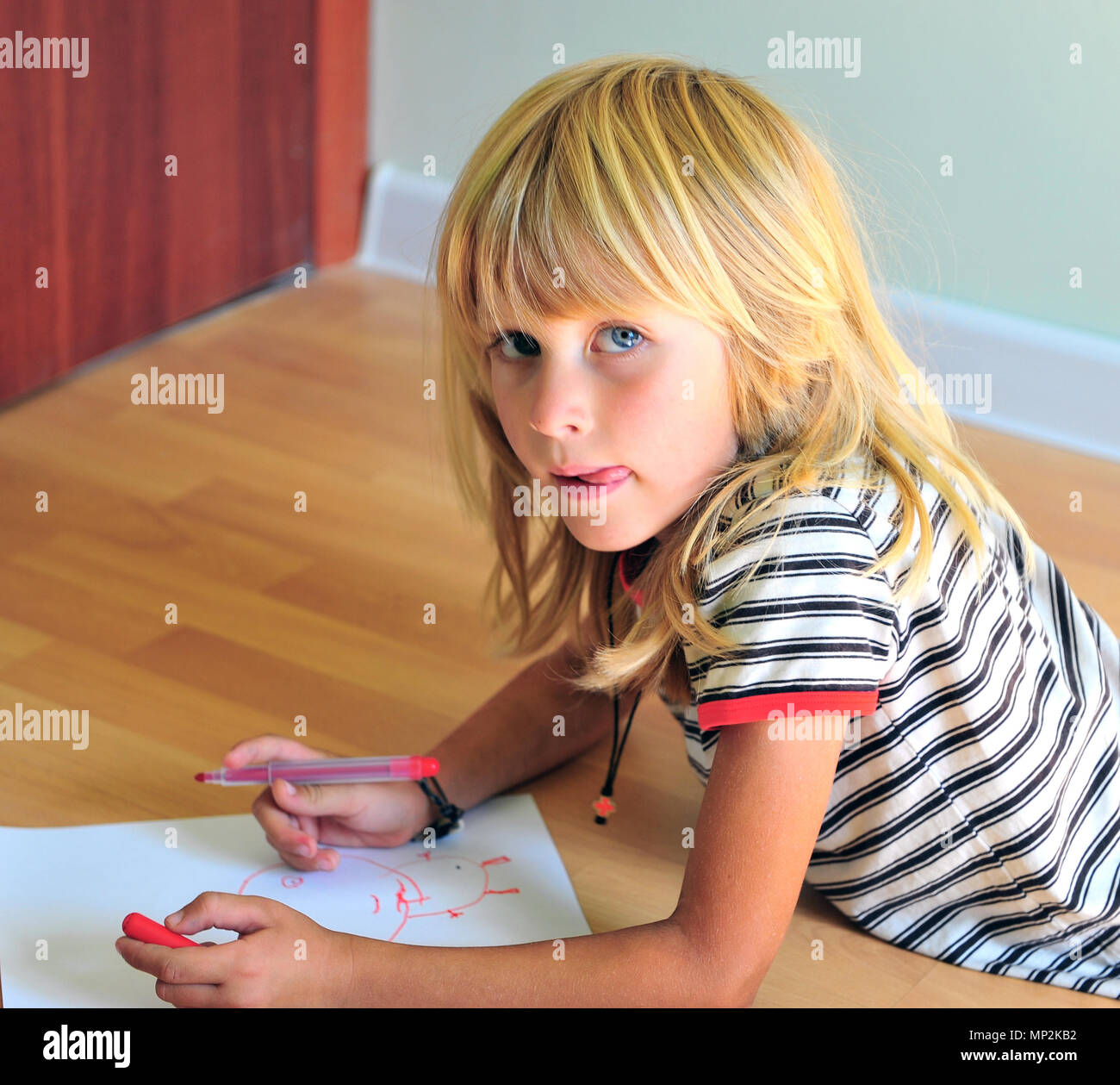 Happy kid drawing hi-res stock photography and images - Alamy