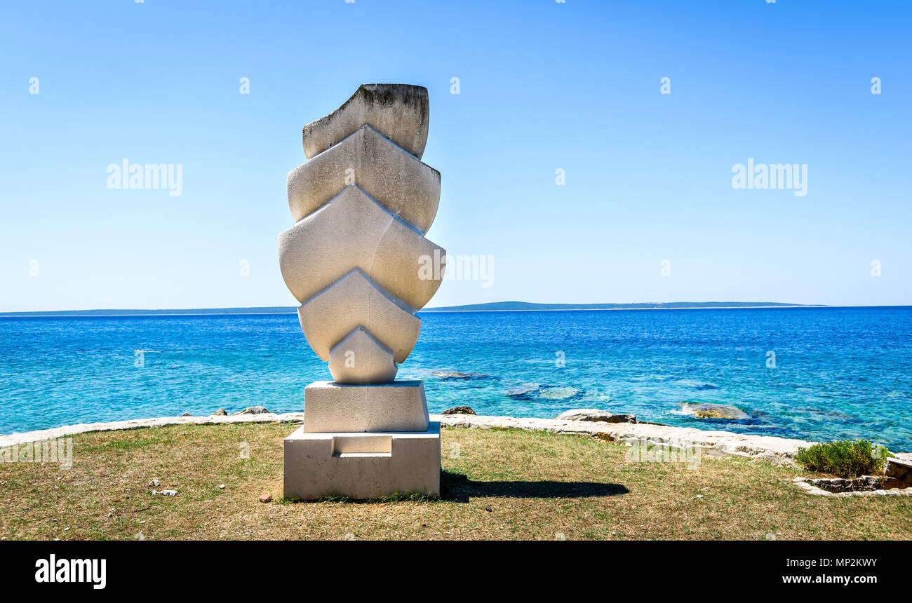 Sculpture "The Sails" on shore of Island Silba, Croatia. The statue is ...