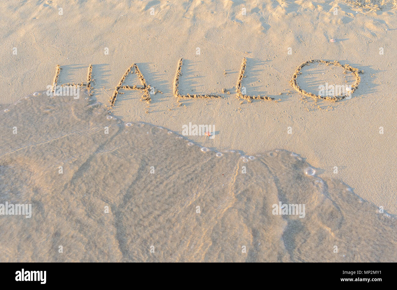 Word Hello Written In Sand High Resolution Stock Photography and Images ...