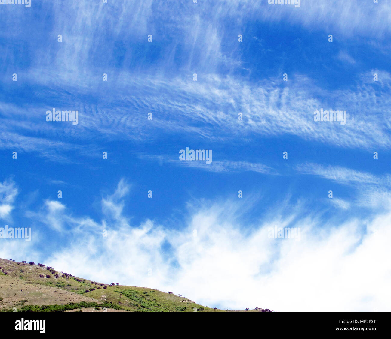 High Altitude Cirrus and Cirrocumulus Clouds on a Brilliant Blue Sky ...
