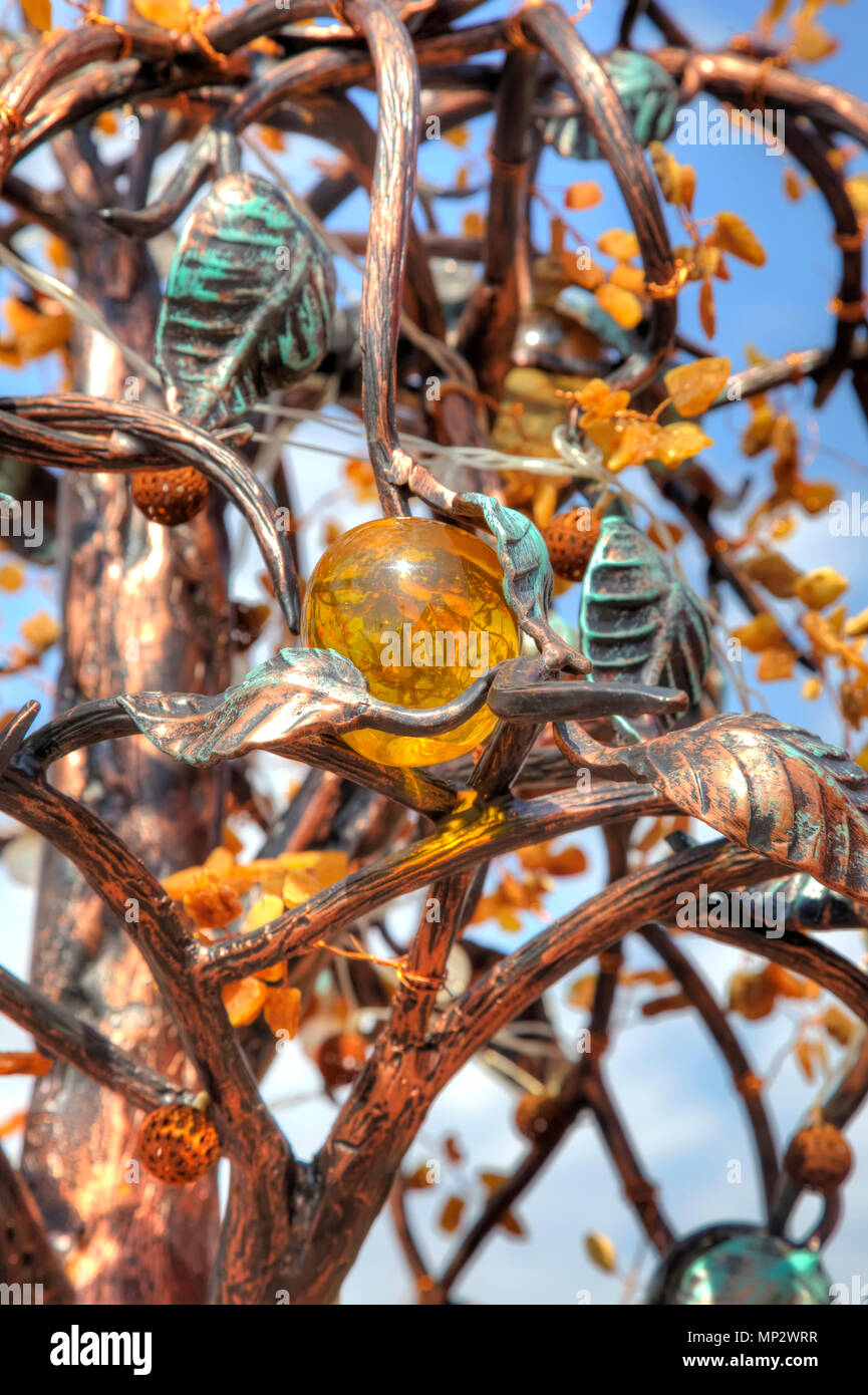 KALININGRAD, RUSSIA - April 29.2018: Amazing metal tree with amber ...