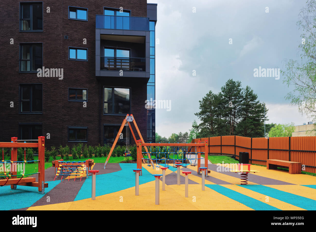 Children playground at European modern complex of apartment residential ...