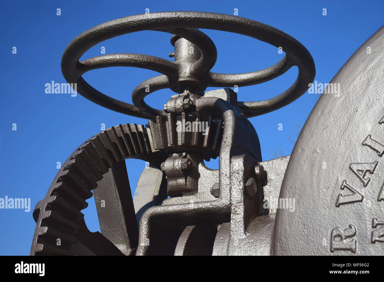 A portion of an old steel industrial valve used at a water treatment ...
