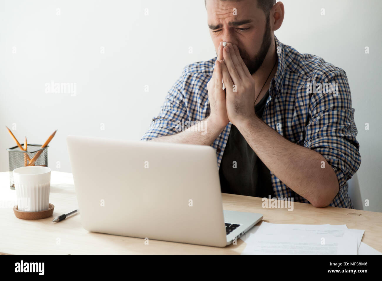 Ill man suffering from congestion and fever Stock Photo - Alamy