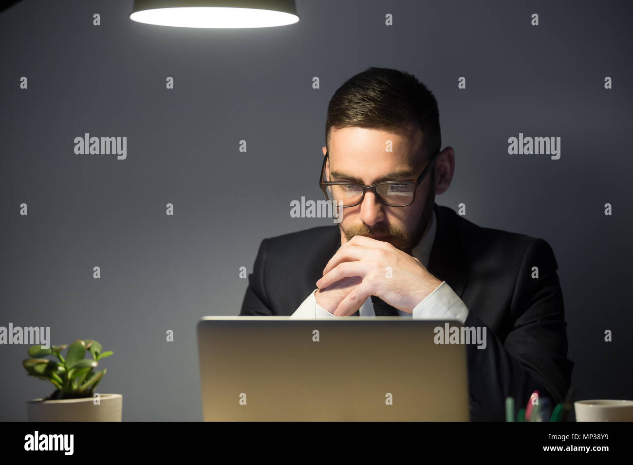 Concerned man thinking hi-res stock photography and images - Alamy
