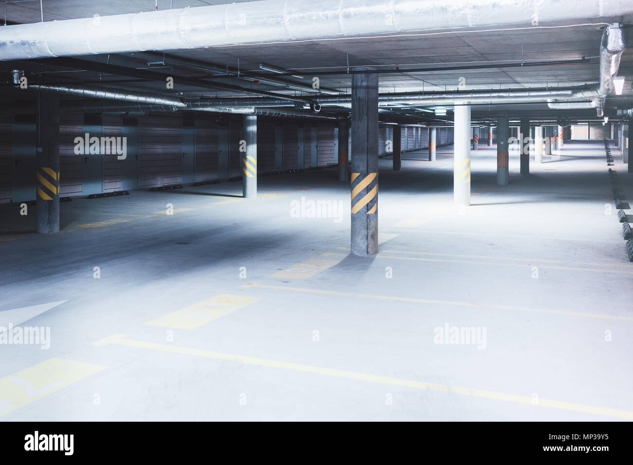 Underground car parking garage in a modern apartment building Stock Photo - Alamy