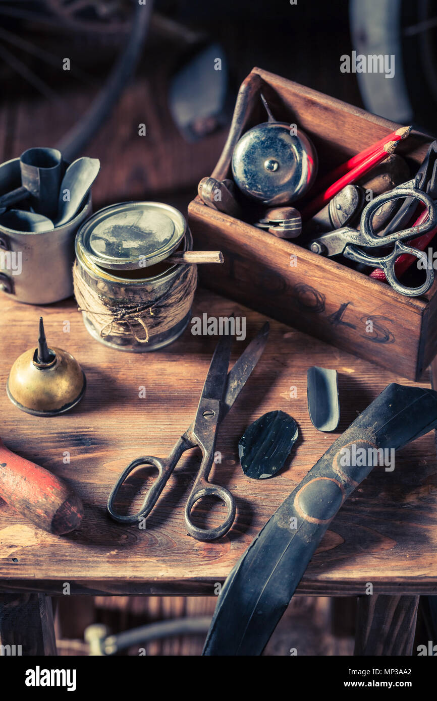 Closeup of bicycle repair workshop with tools, wheels and tube Stock ...
