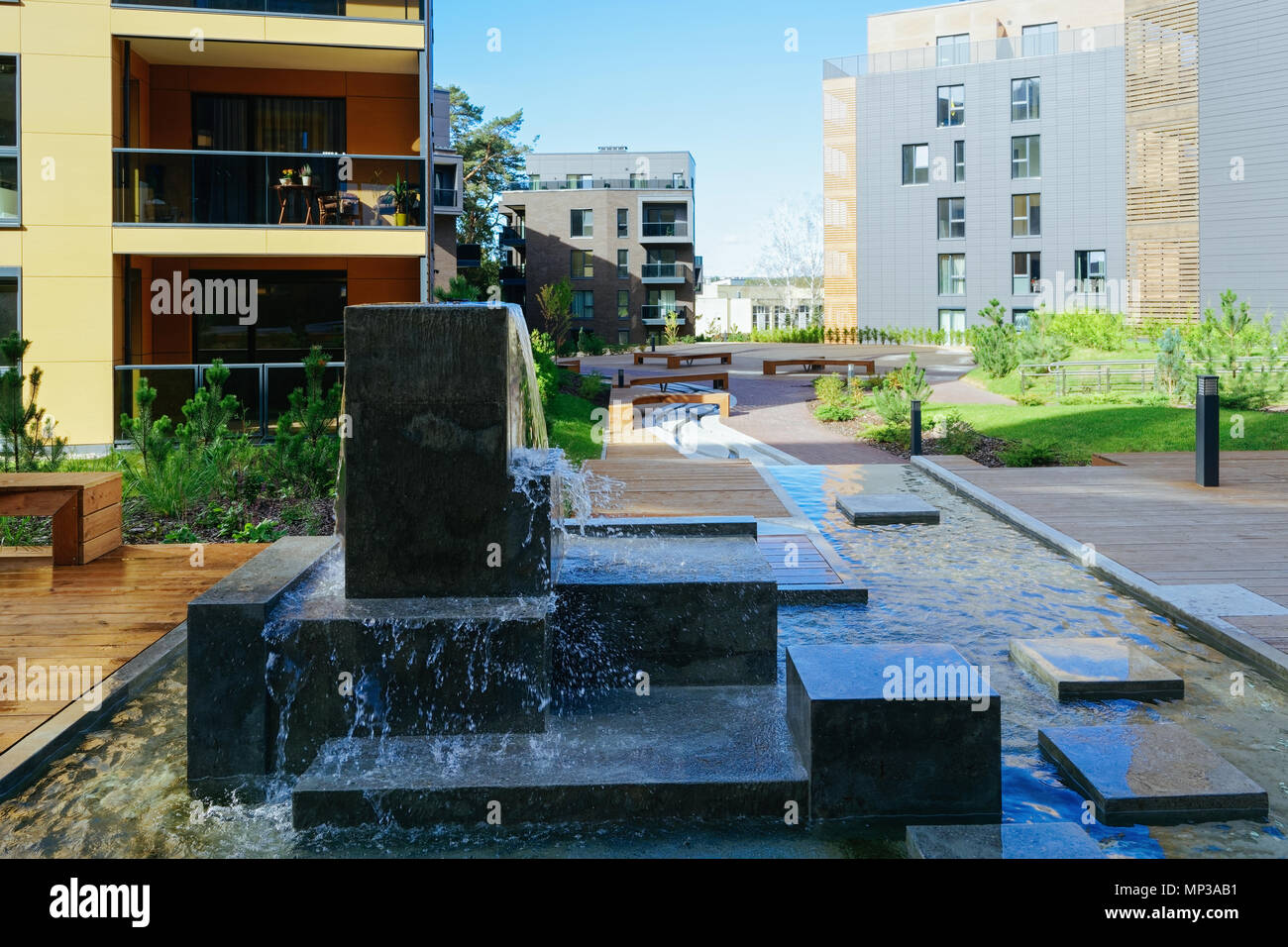 Fountain at complex of residential apartment buildings. And outdoor ...