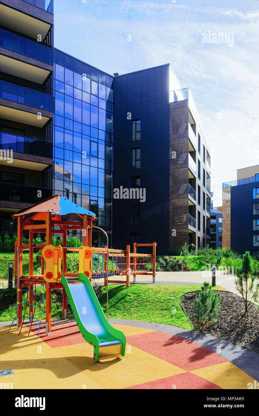 Children playground at complex of residential building quarter. And ...