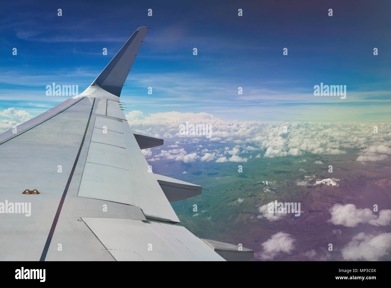 Plane over mountain hi-res stock photography and images - Alamy
