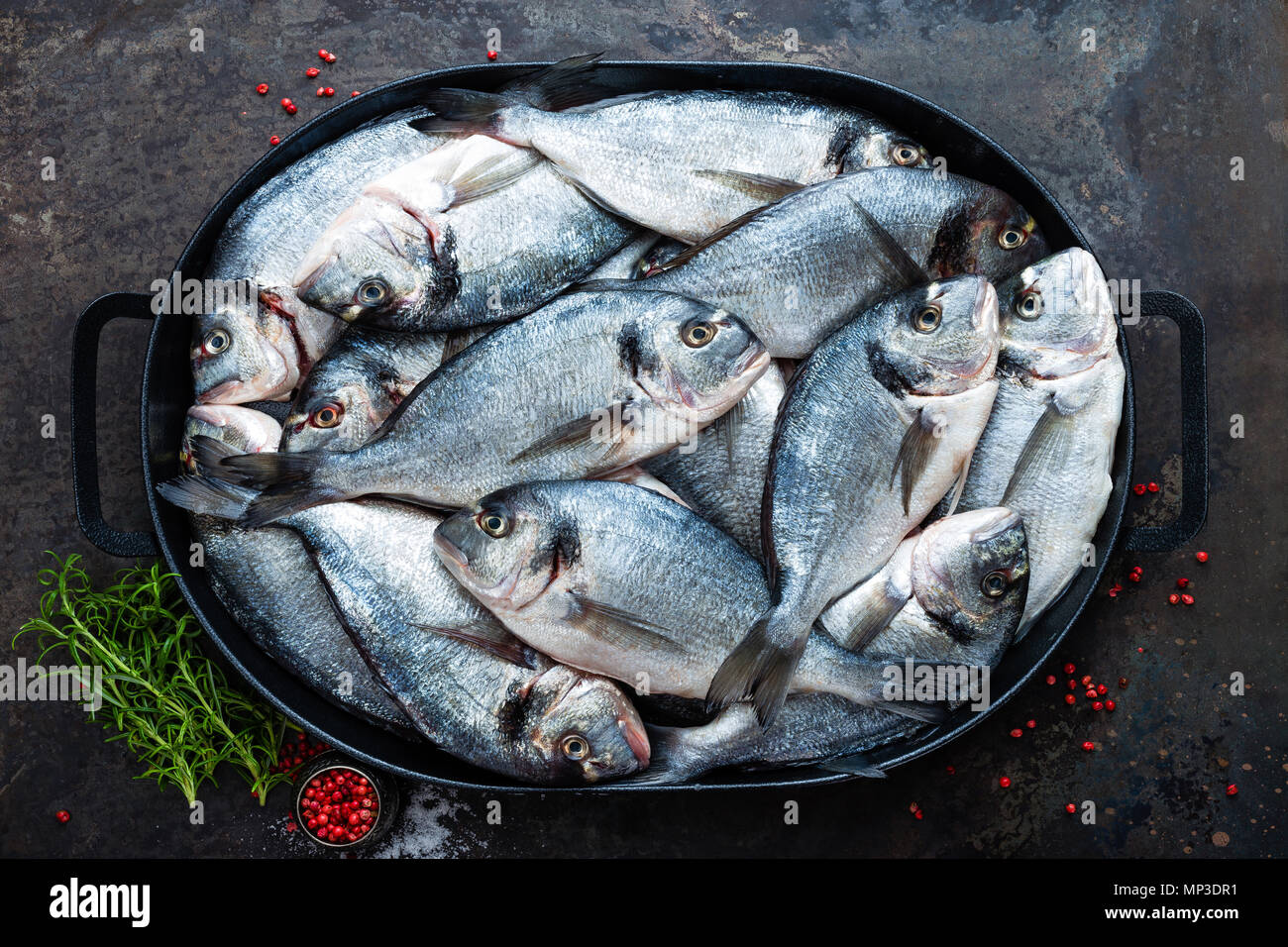 Fish. Fresh sea bream. Raw dorado fish Stock Photo - Alamy