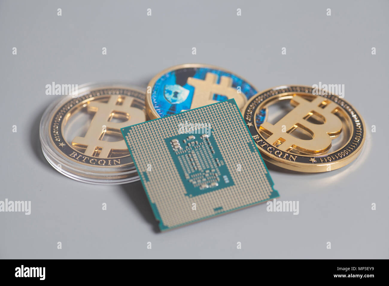 Central processing unit CPU microchip with Bitcoins Stock Photo - Alamy