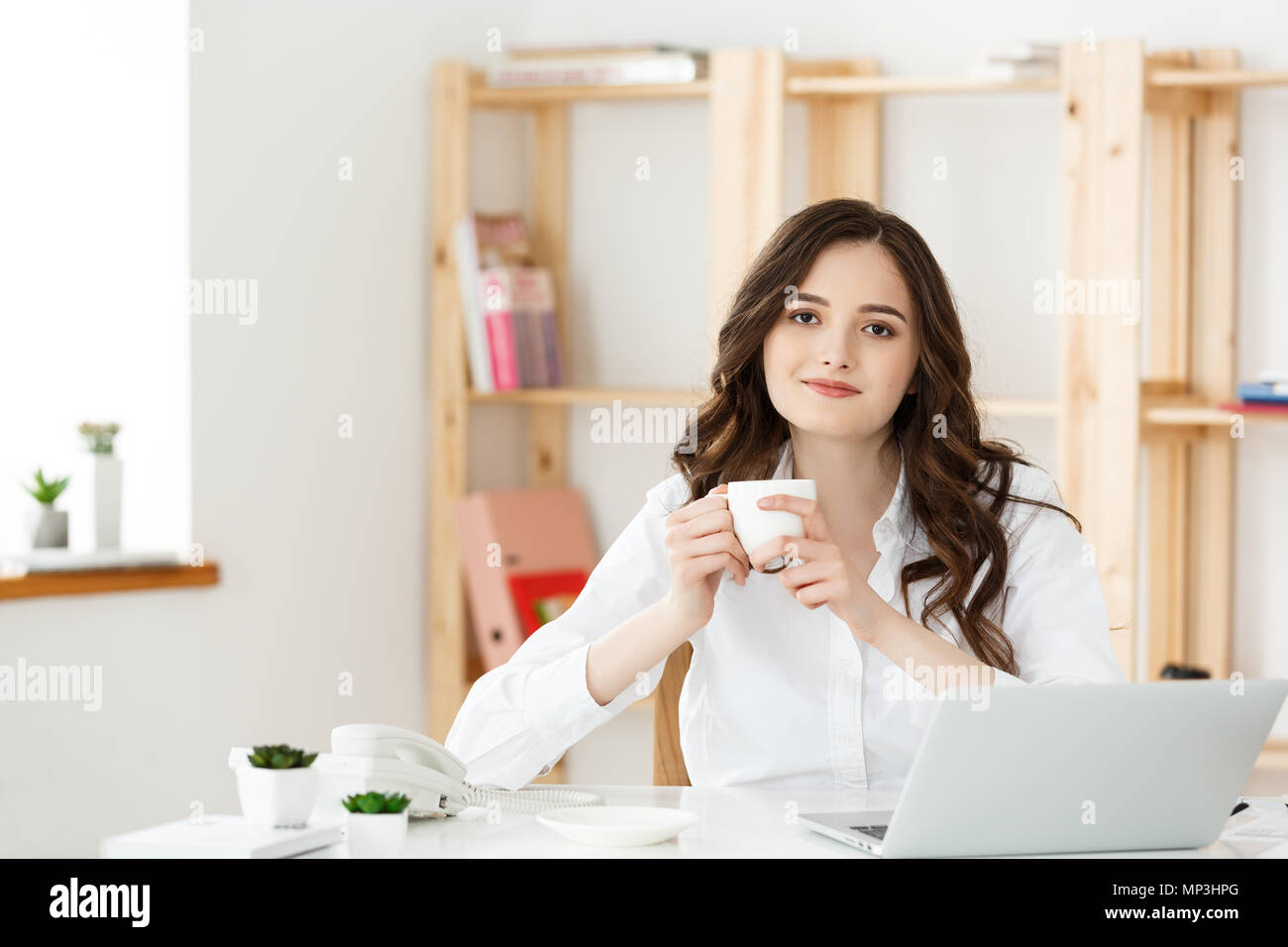 Woman Freelancer or business woman used Labtop working at modern office ...