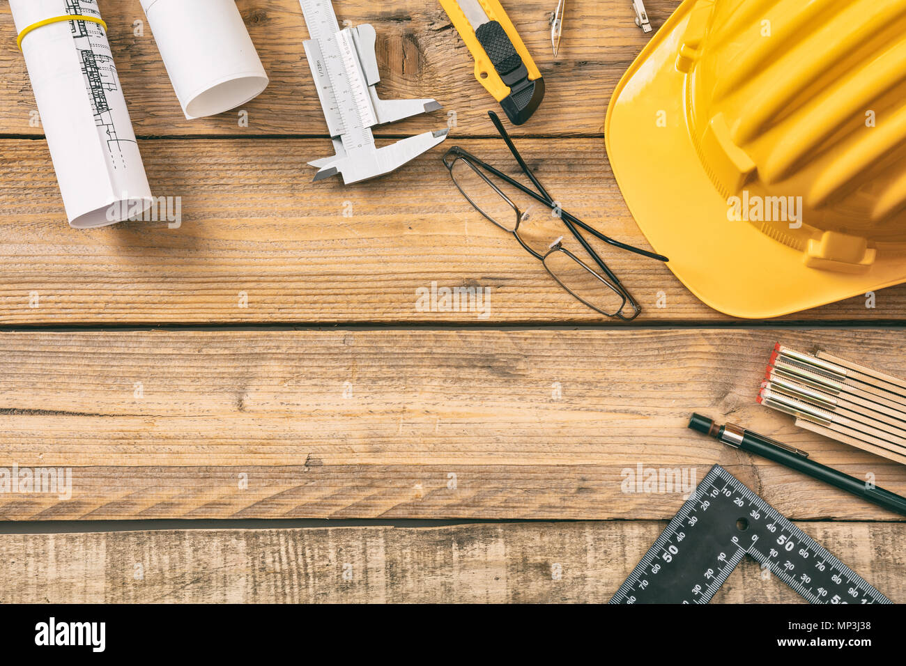 Architect workplace top view. Project construction blueprints and ...