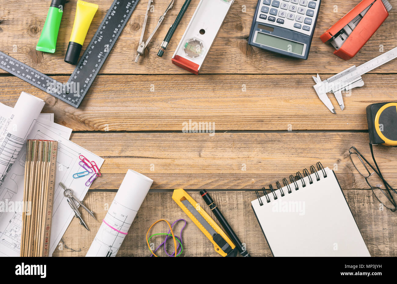 Project construction site. Hand tools, blueprints and engineering ...