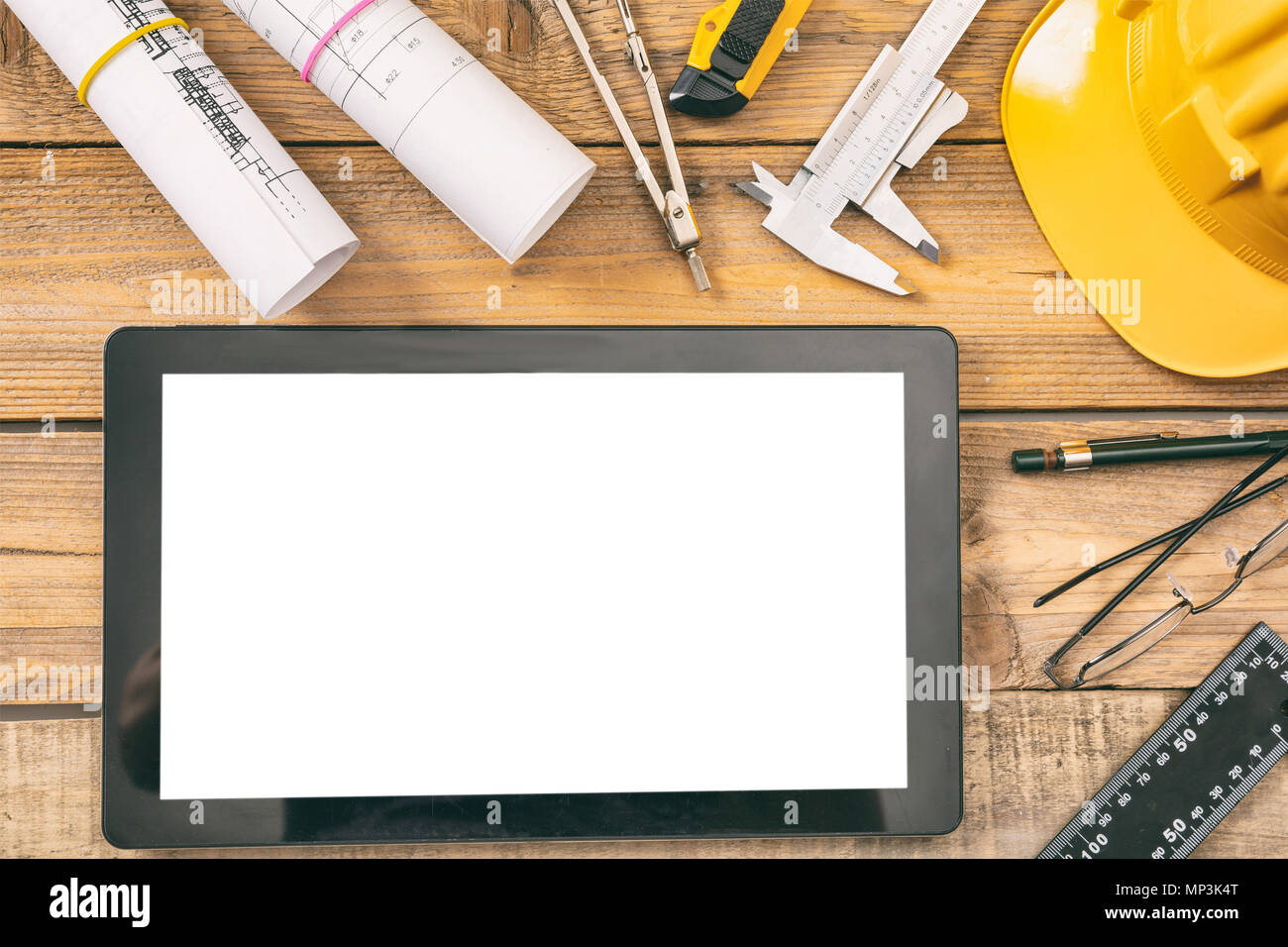 Architect workplace and technology. Tablet with white blank screen ...