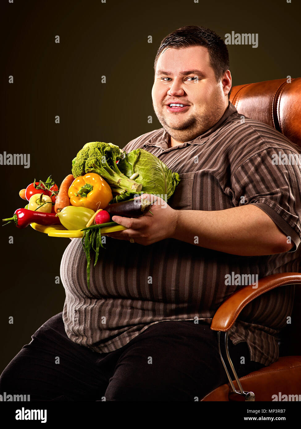 Diet fat man eating healthy food. Healthy breakfast with vegetables ...