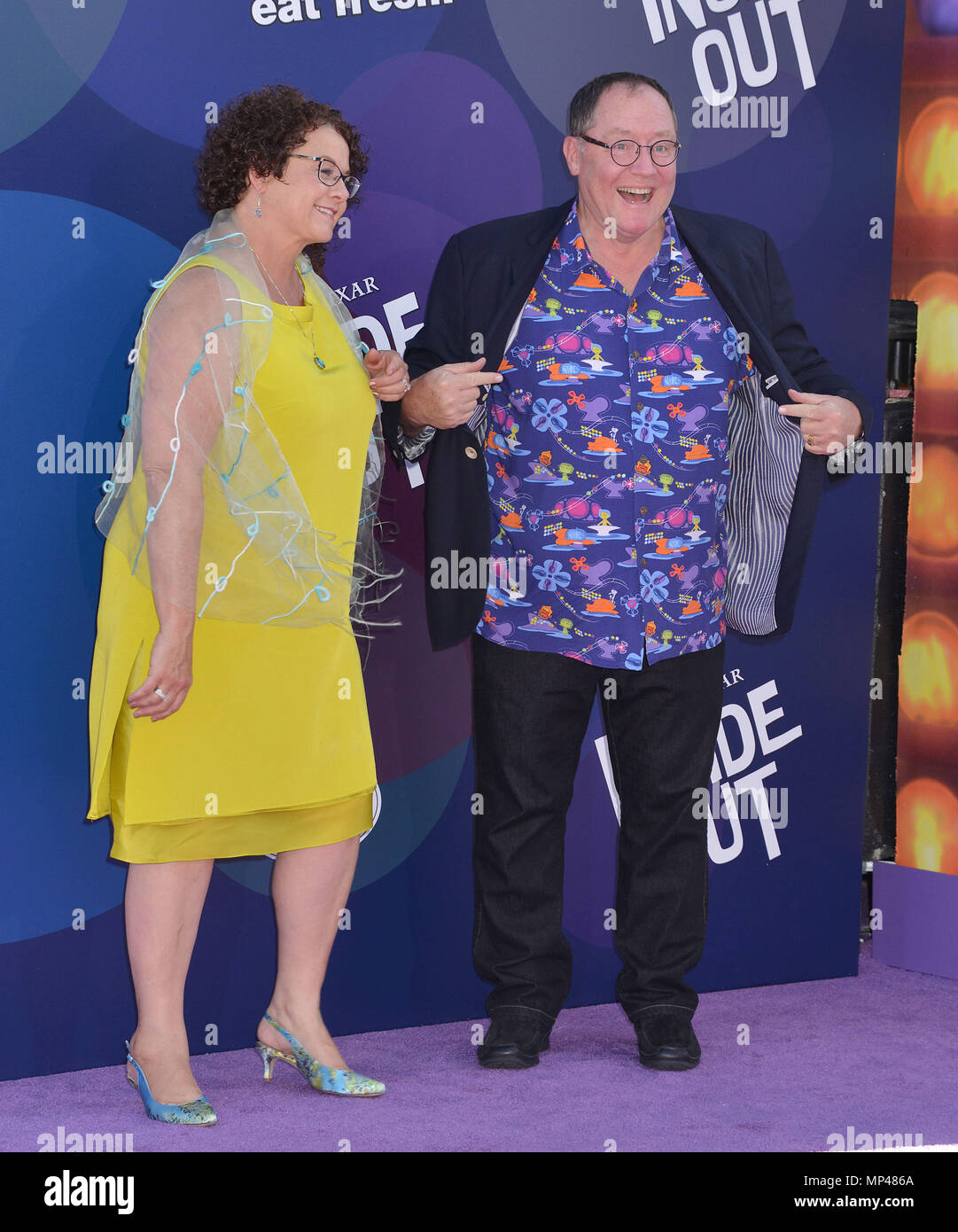 John Lasseter, Nancy Lasseter 151 at the Inside Out Premiere at the El ...