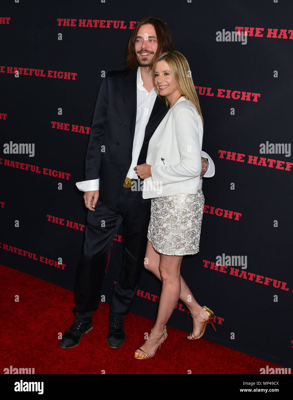 Mira Sorvino, Chris Backus 139 at the Hateful Eight Premiere at the ...